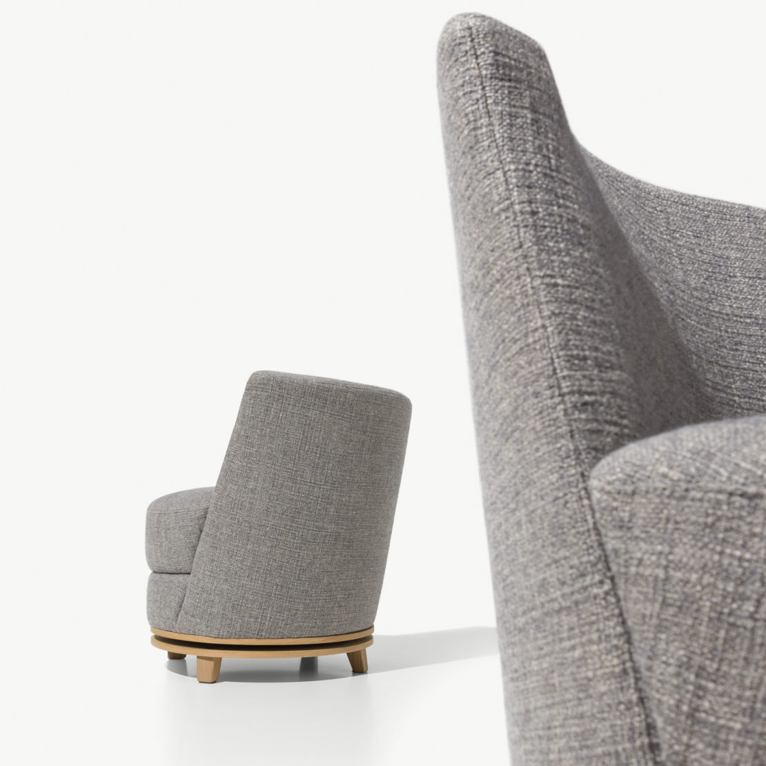 Curved Occasional Chair With Swivel Base - Juliettes Interiors